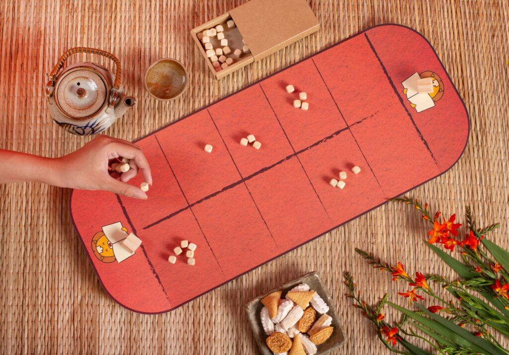 The game of squares (O an quan) - Vietnam Travel Documents